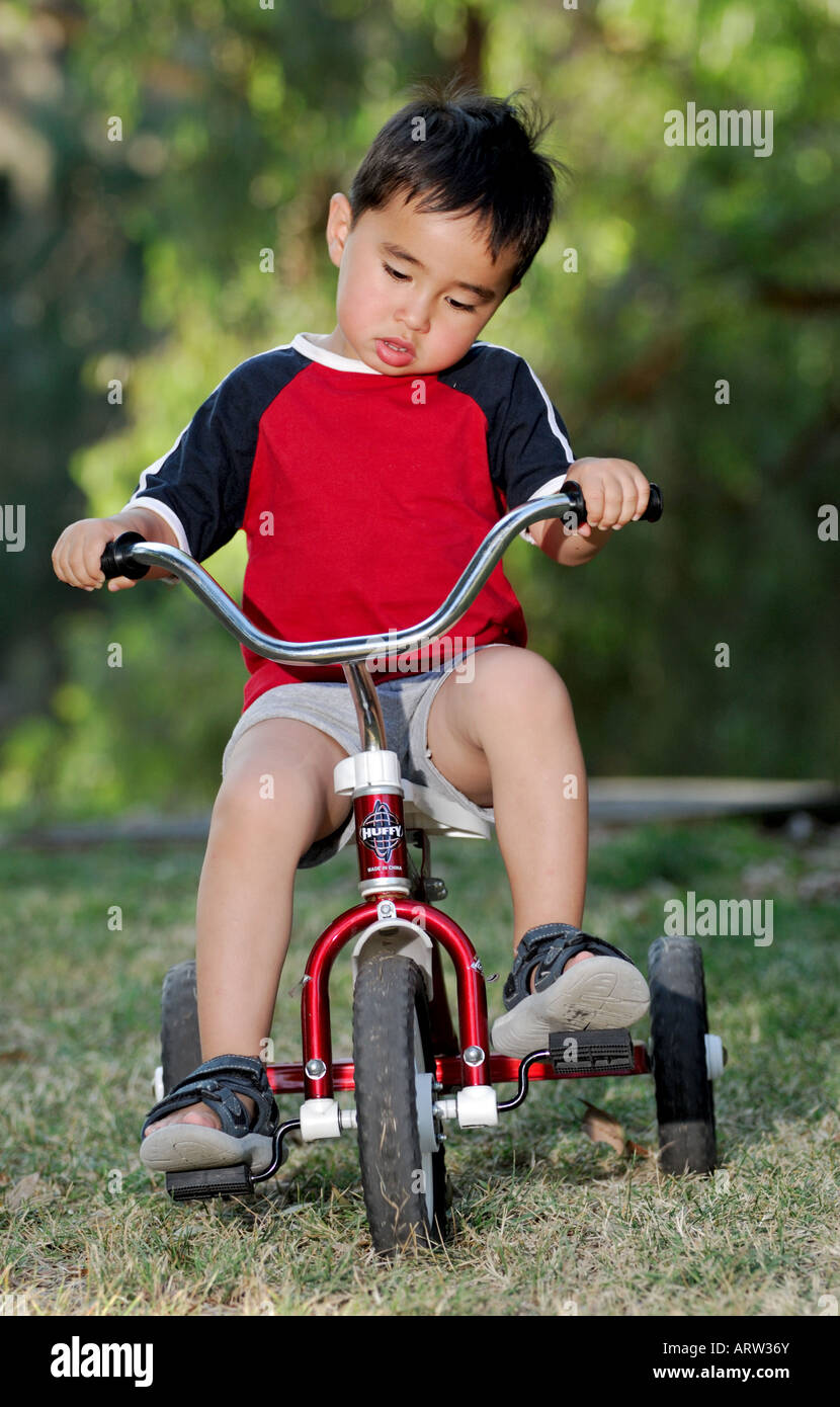 Boy on bicycle Stock Photo - Alamy