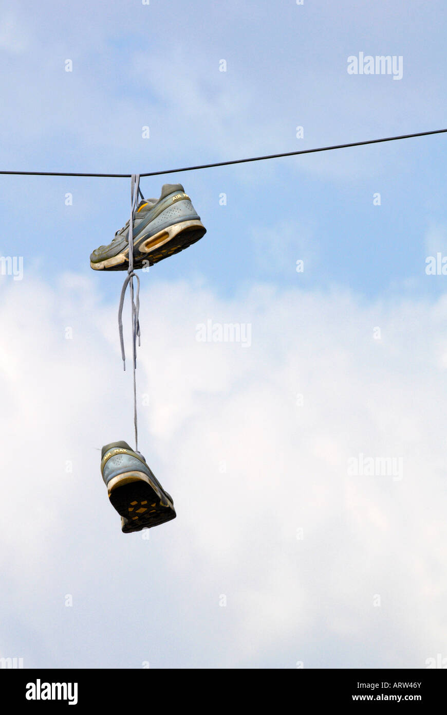shoes discarded as trash Stock Photo - Alamy