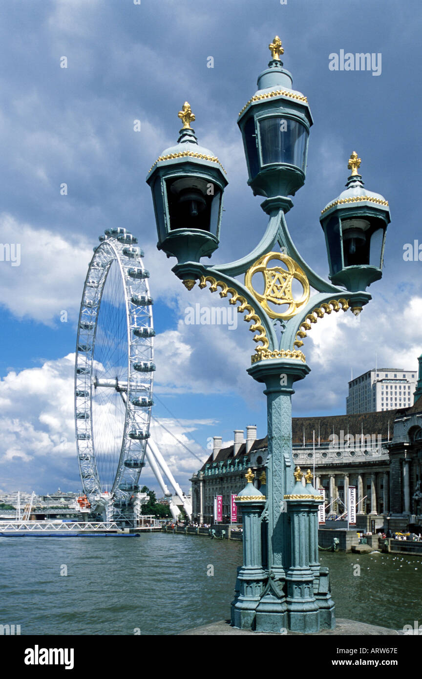 London Eye with lamps on Westminster bridge Stock Photo - Alamy