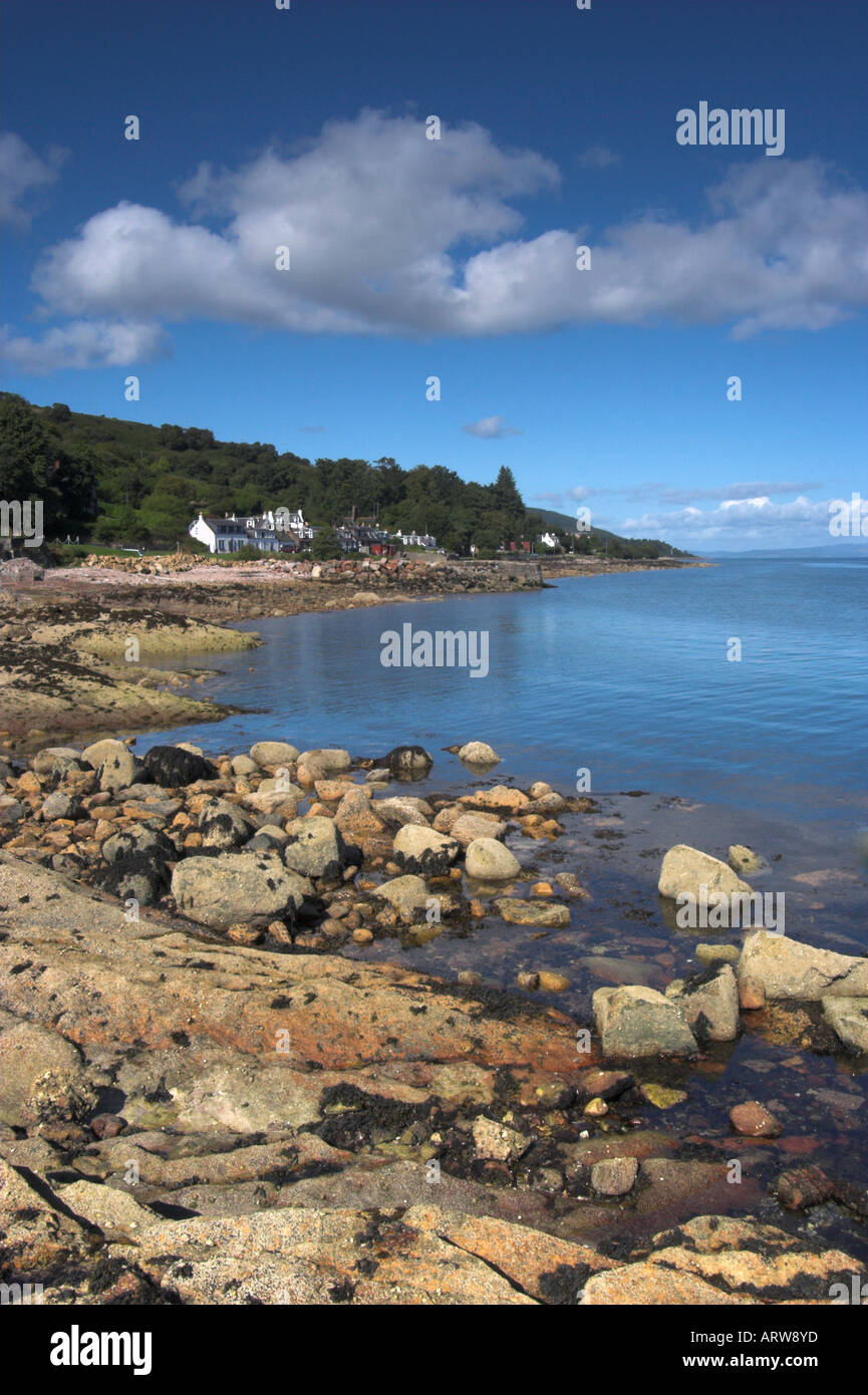vertical landscape photo of the rocky shore at Corrie on the Isle of ...