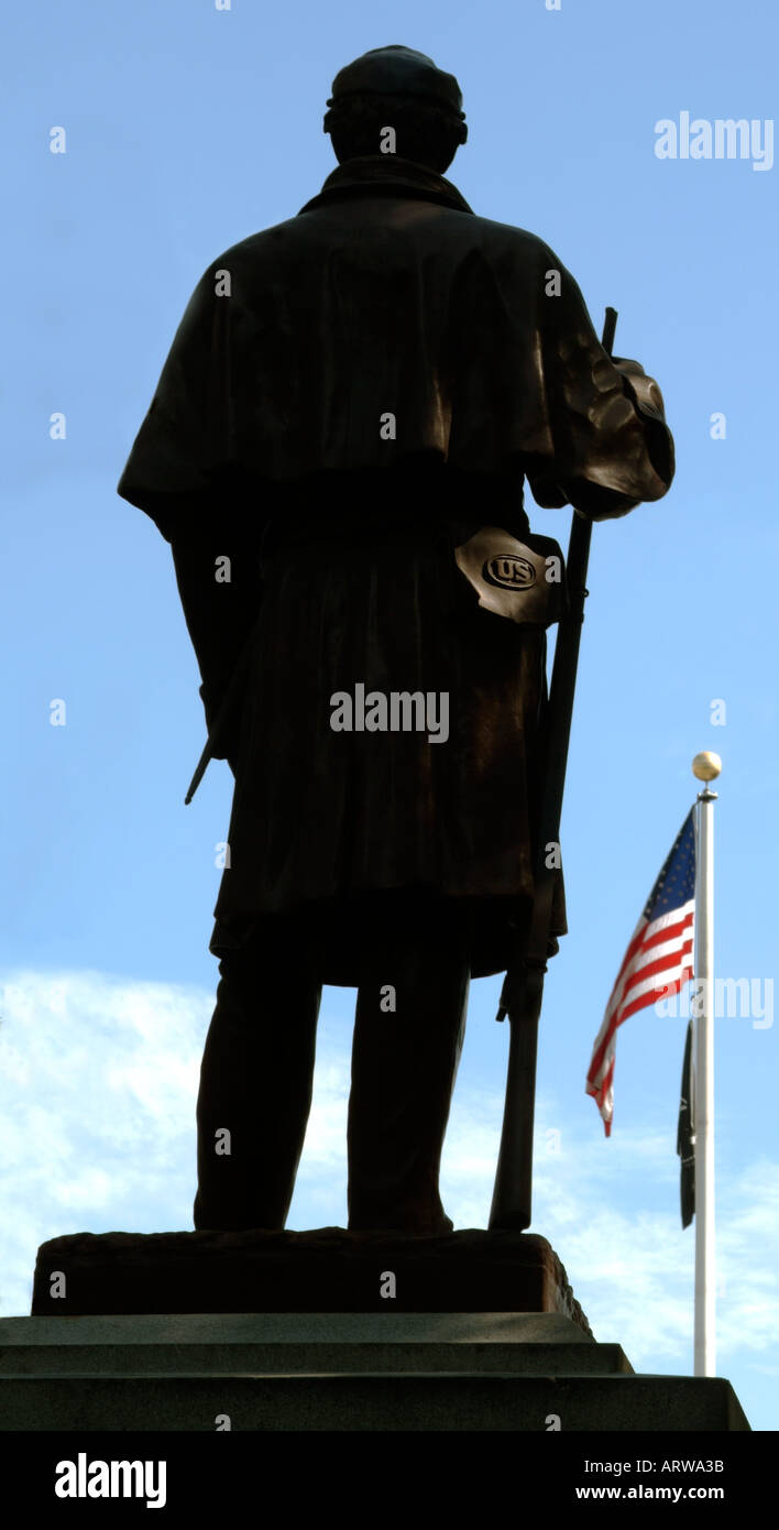 A statue of a U S Civil War Union soldier overlooks an American flag in ...