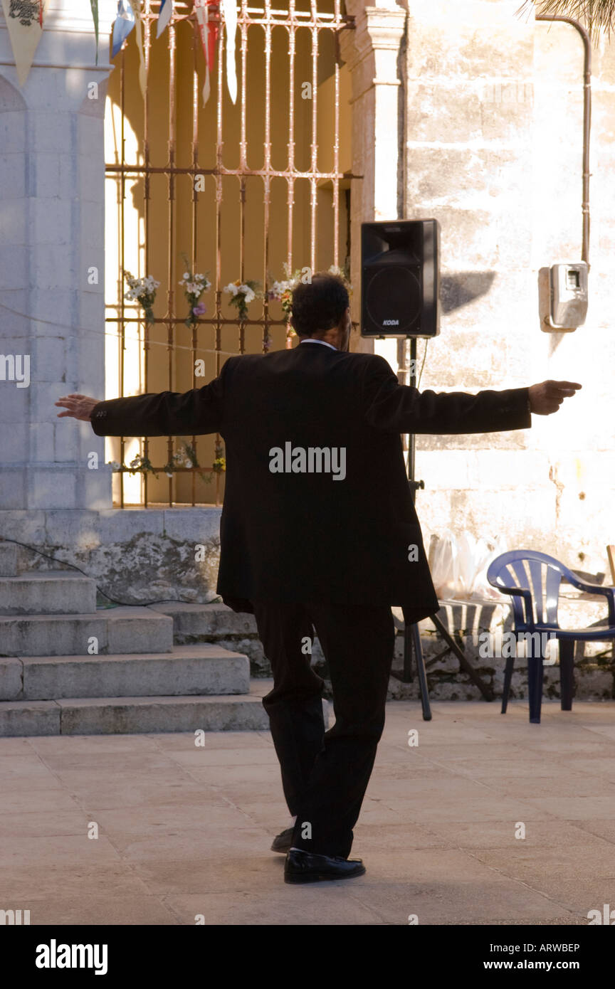 Villager dancing at a Paniyiri, a local festival, in Proastio near ...