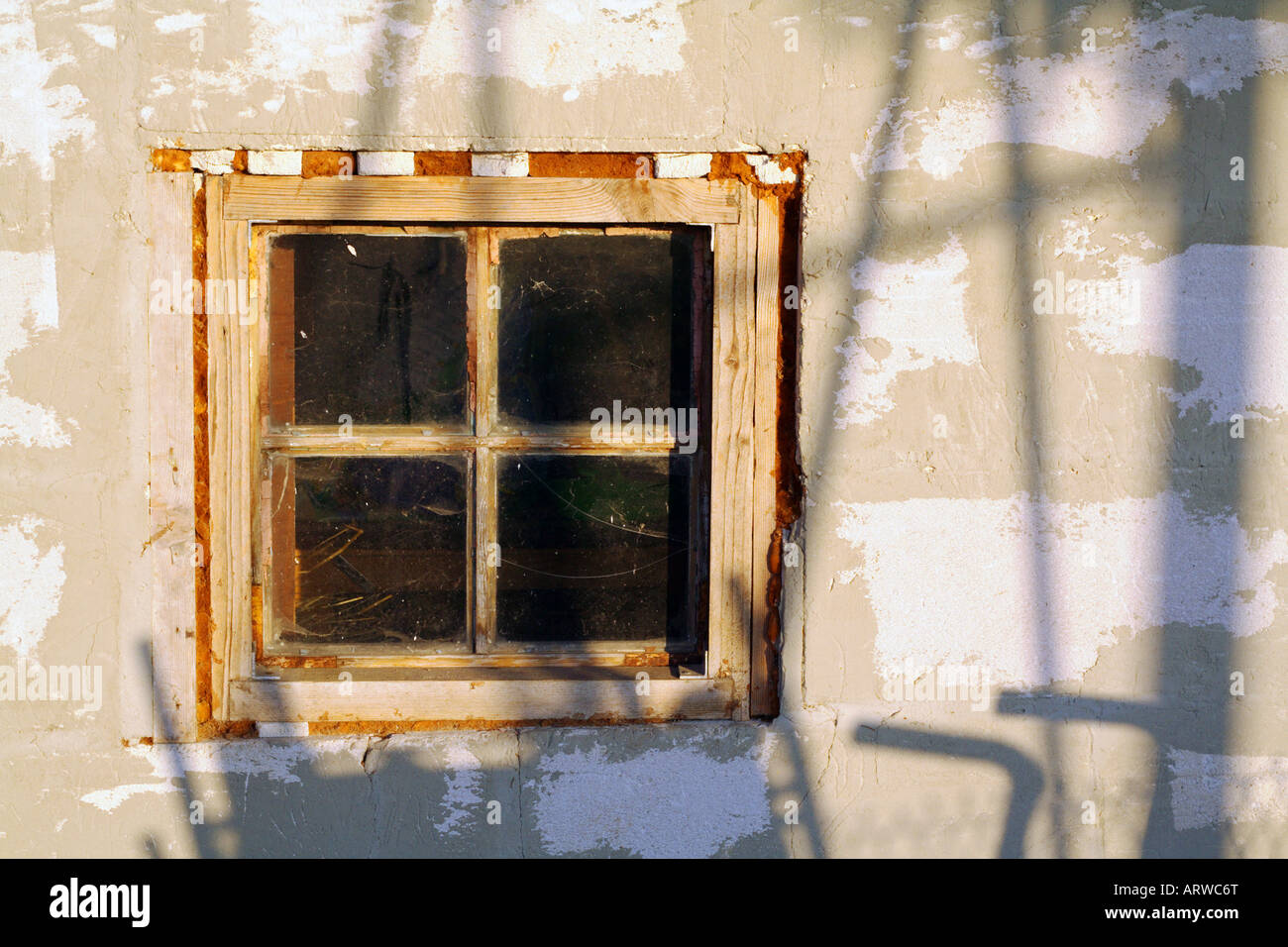 Unfinished old window with frame Stock Photo - Alamy