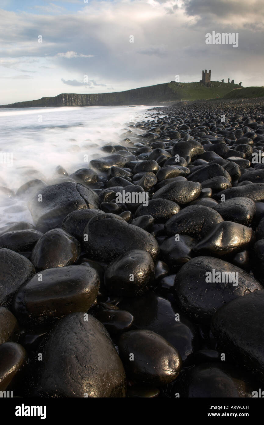 Dunstanburgh castle from the beach at Embleton, Northumberland UK Stock ...