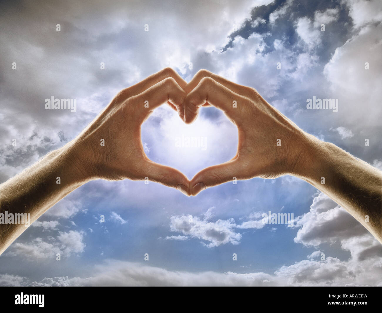Hands forming a symbolic heart Stock Photo - Alamy