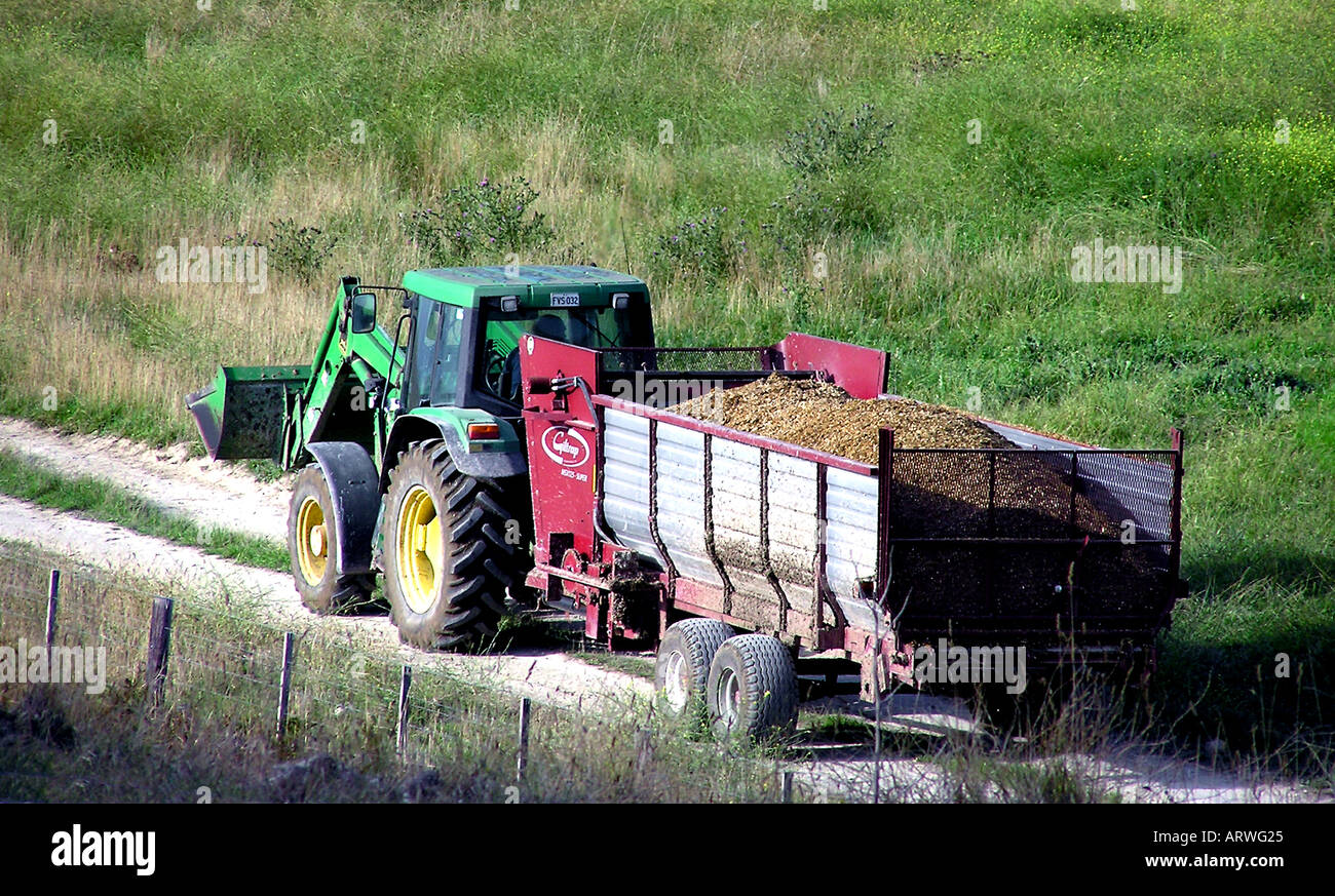 Farm tractor and trailer Stock Photo - Alamy