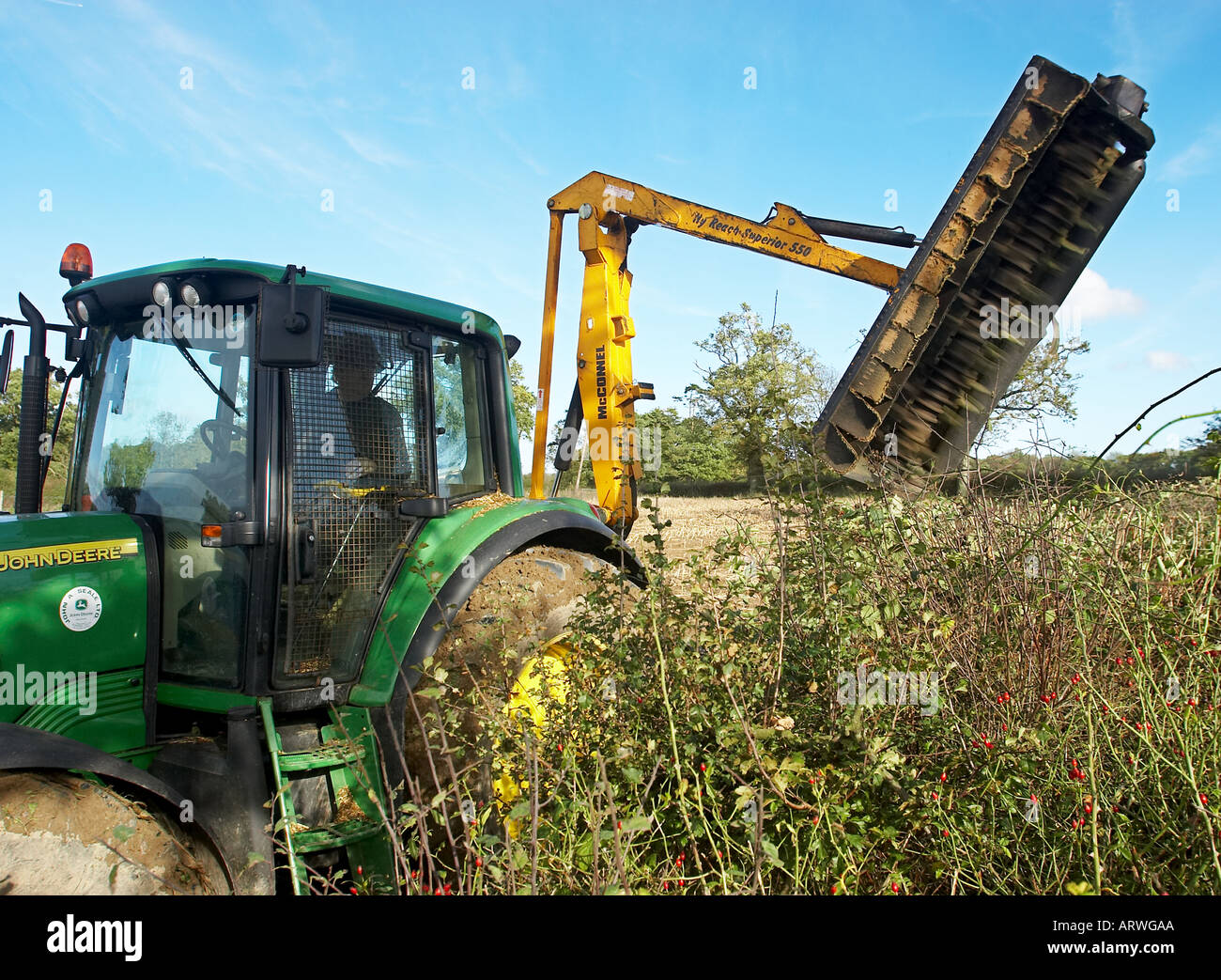 Hedge trimming on the farm Stock Photo - Alamy