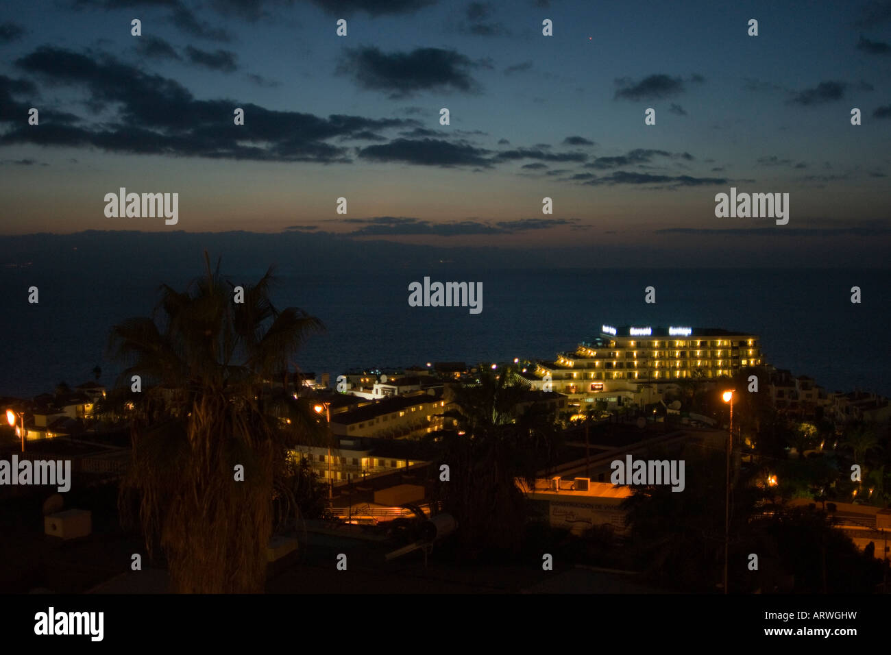 Tenerife Puerto de Santiago night view with hotel Barcelo Santiago ...