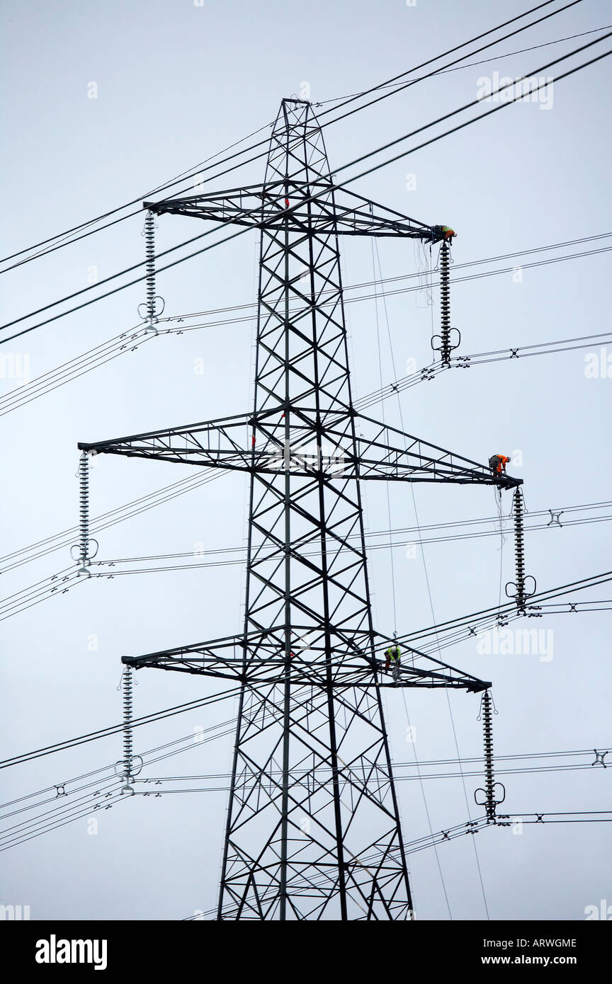 Men working on National Grid Pylon West Yorkshire England Stock Photo ...