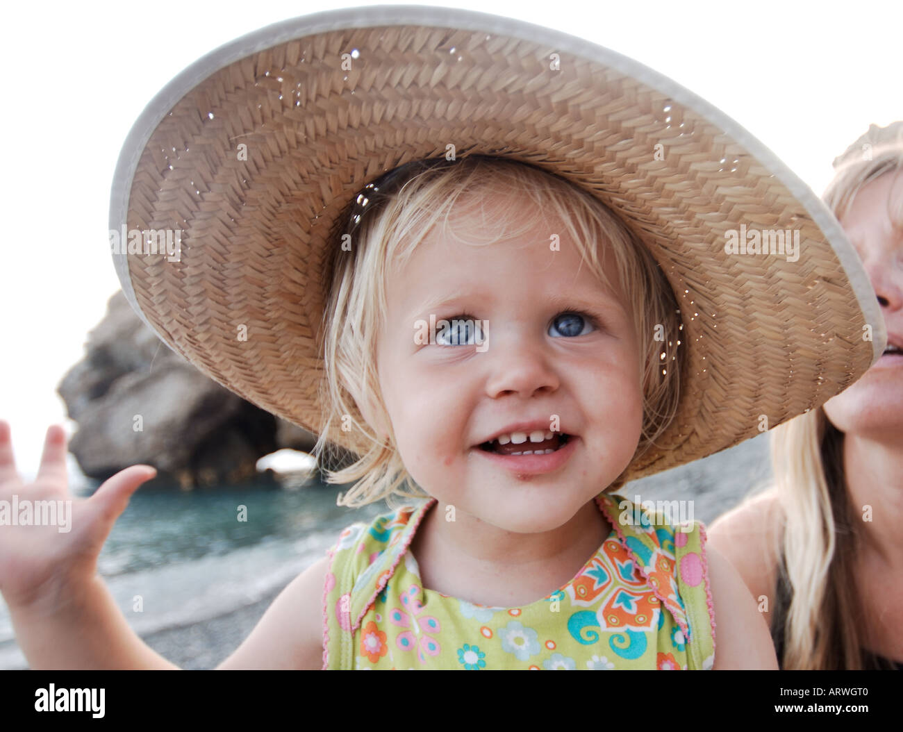 Crete girl posing with hat Stock Photo - Alamy
