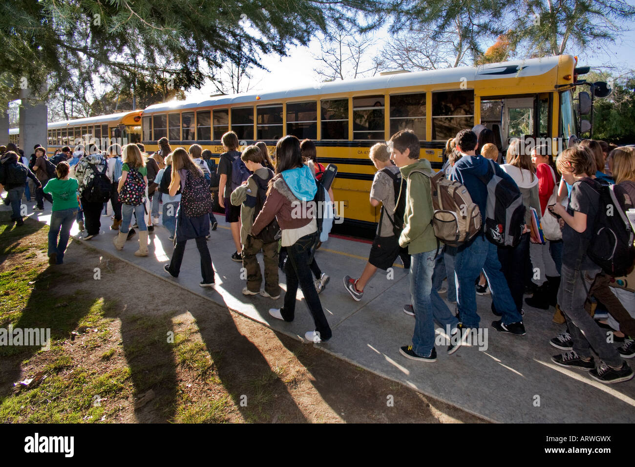 California middle school students walk to buses as school is dismissed ...
