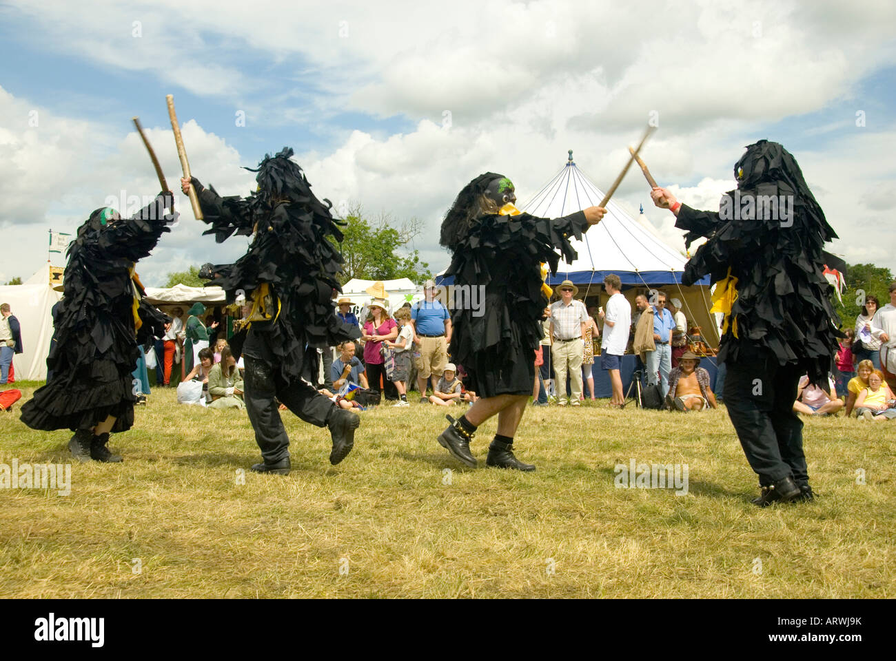 Bedlam Morris Dancers in Black Rag Robes Dance Fight with Sticks in ...