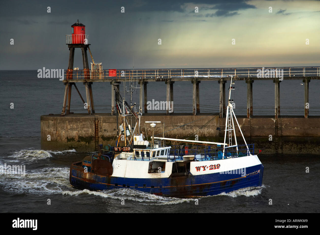 The trawler Defiant returning to Whitby North Yorkshire Coast England ...