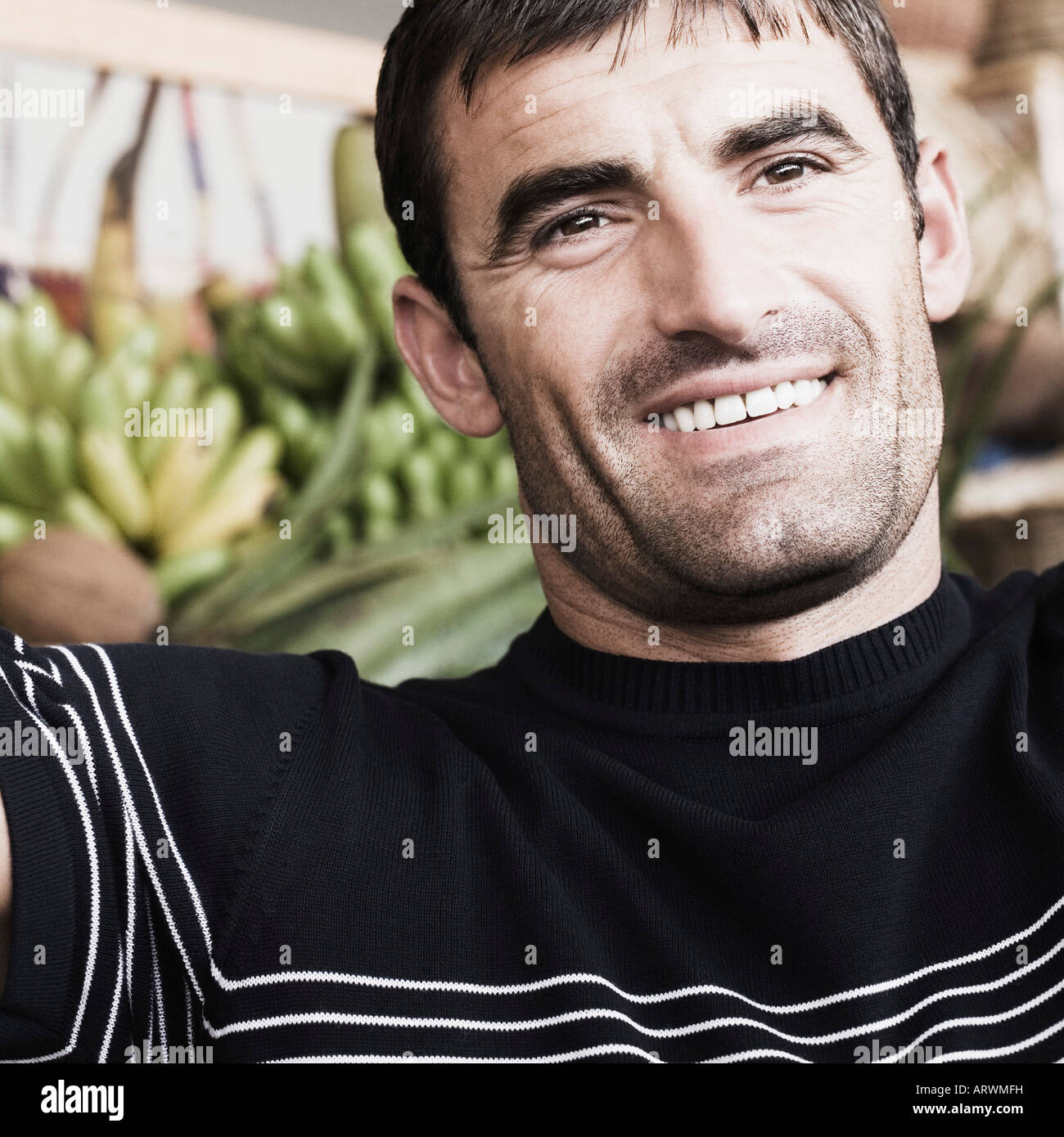 Close-up of a mid adult man smiling Stock Photo - Alamy