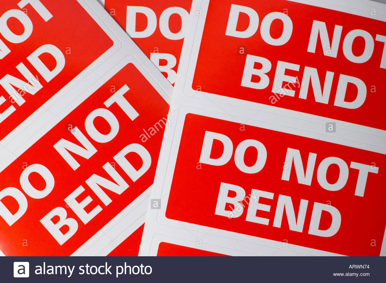 Do not bend sticky labels Stock Photo - Alamy
