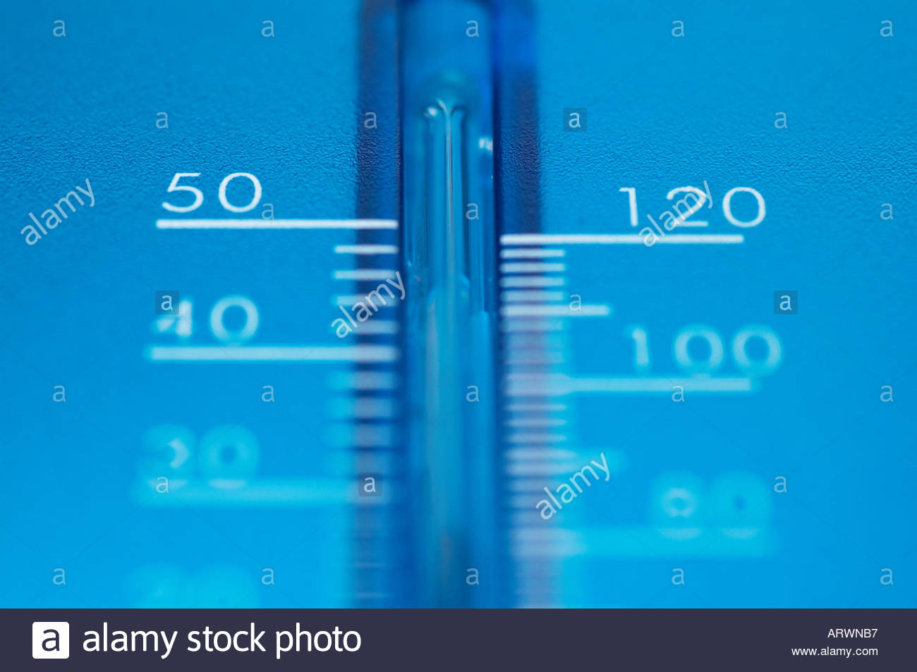 A clear blue thermometer Stock Photo - Alamy