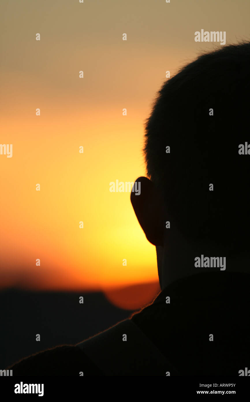 man at sunset Stock Photo - Alamy