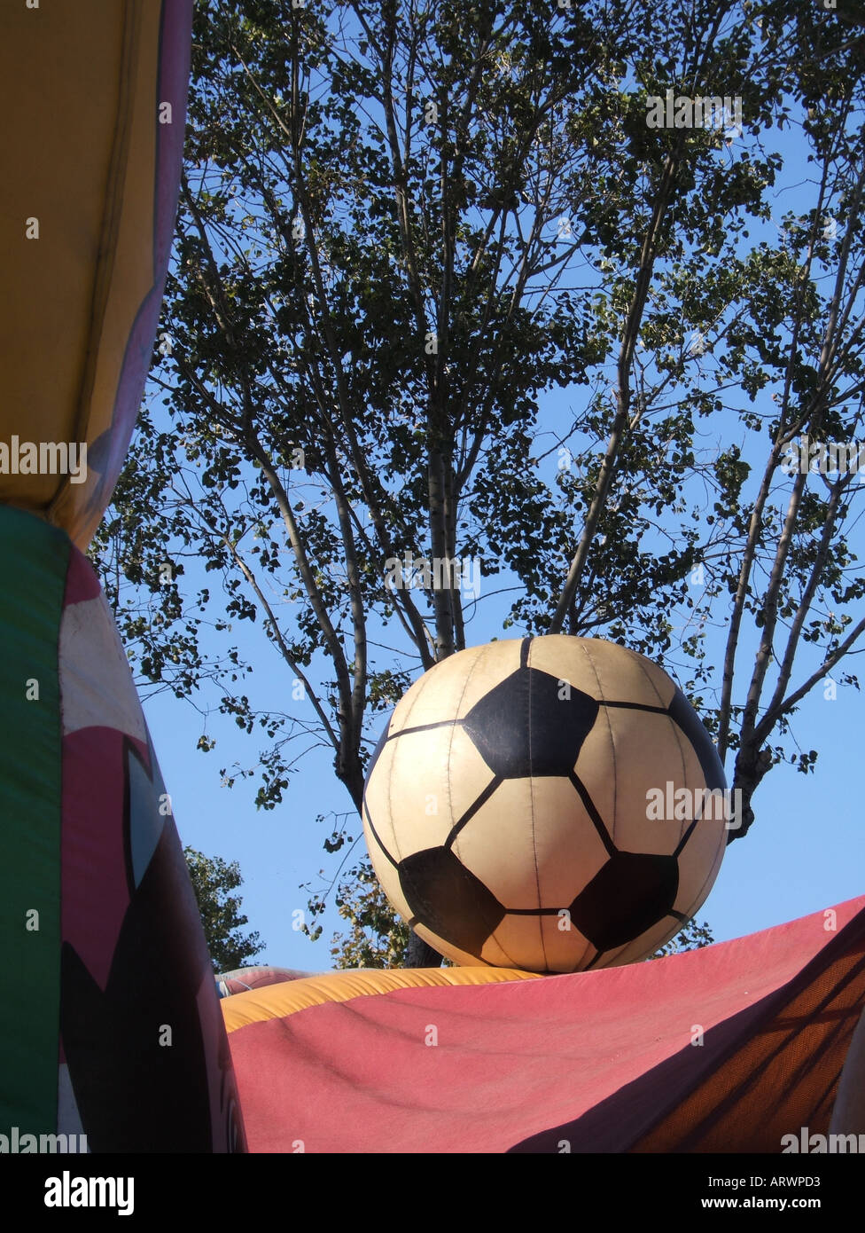 one plastic balloon football in fairground Stock Photo - Alamy