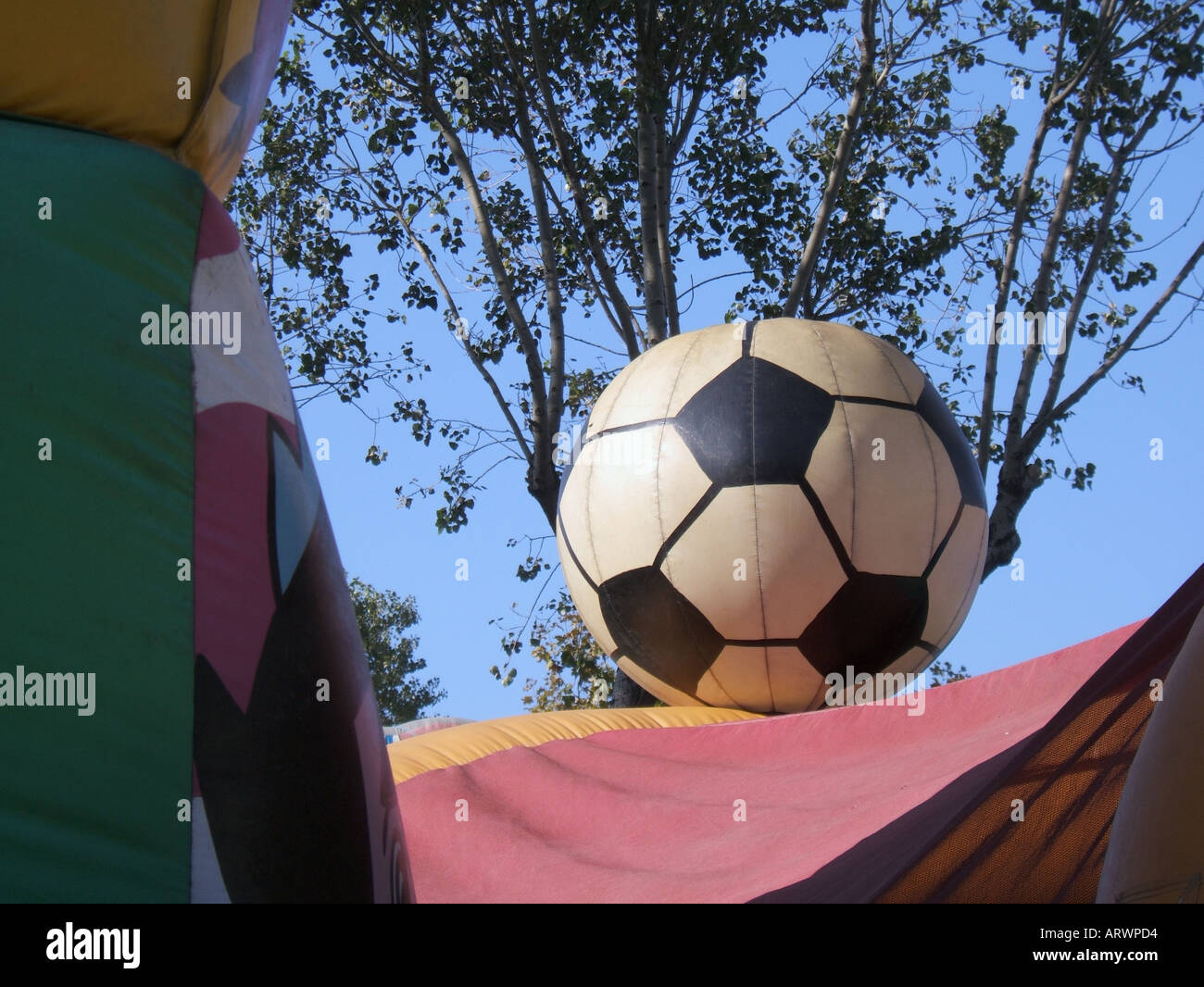 one plastic balloon football in fairground Stock Photo - Alamy