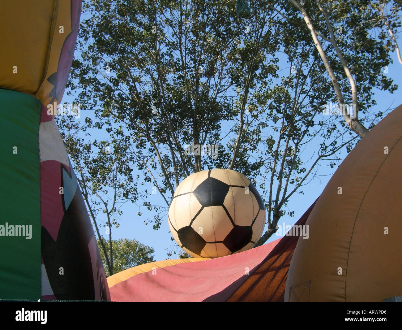 one plastic balloon football in fairground Stock Photo - Alamy