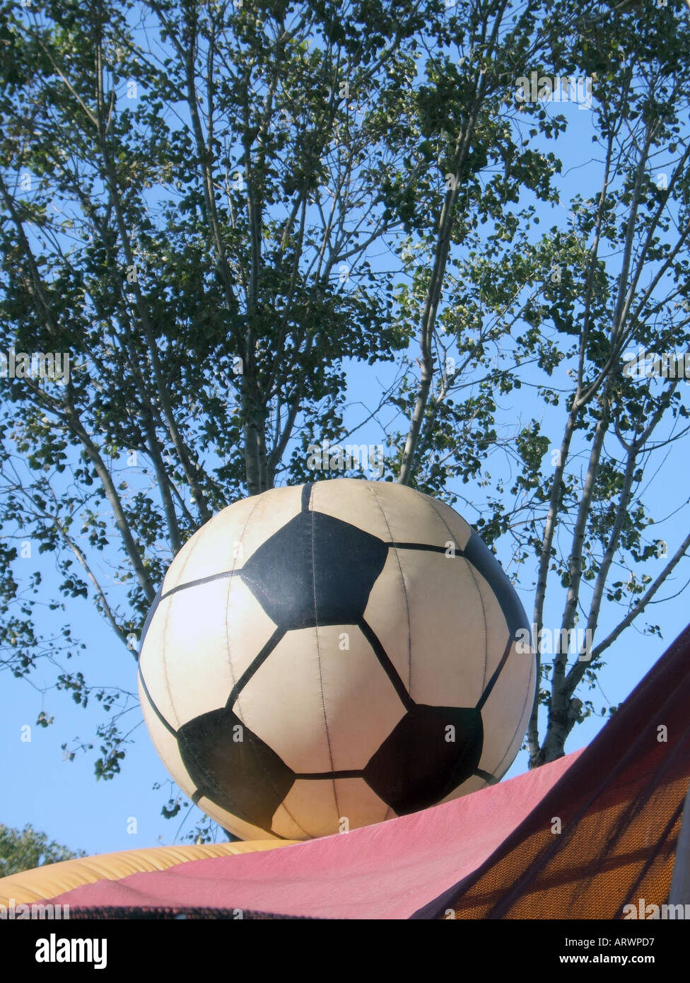 one plastic balloon football in fairground Stock Photo - Alamy