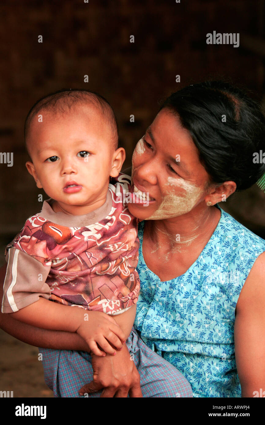 Burmese mother and child wearing thanakha, Bagan, (Myanmar Stock Photo ...