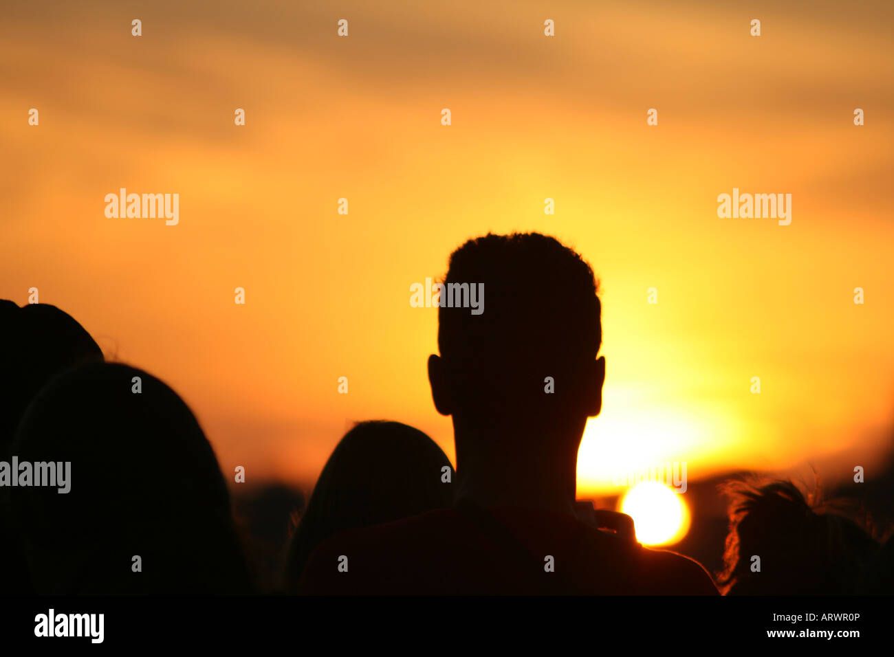 people at sunset Stock Photo - Alamy