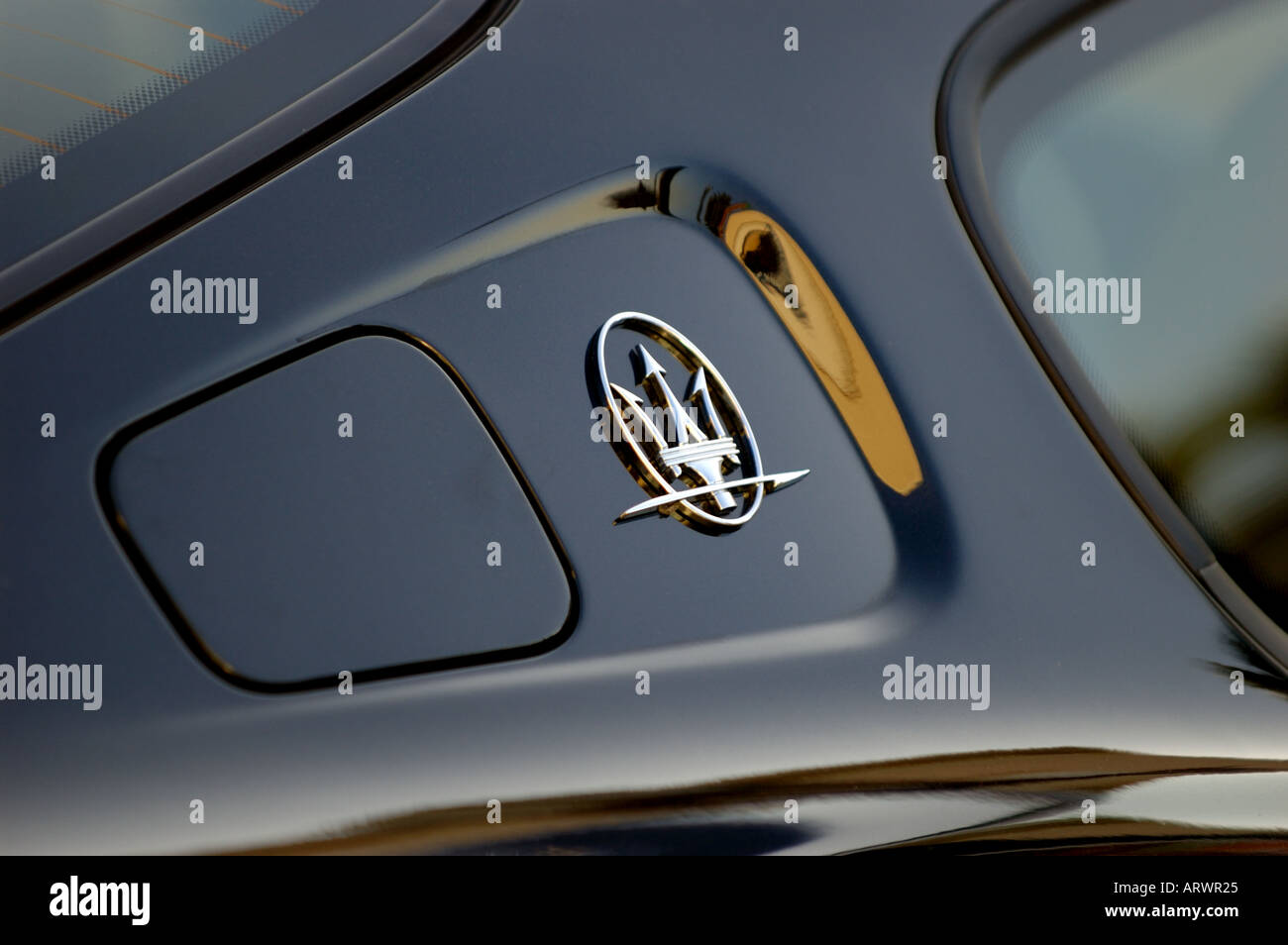 Closeup of Maserati car logo and gas tank cap Stock Photo - Alamy