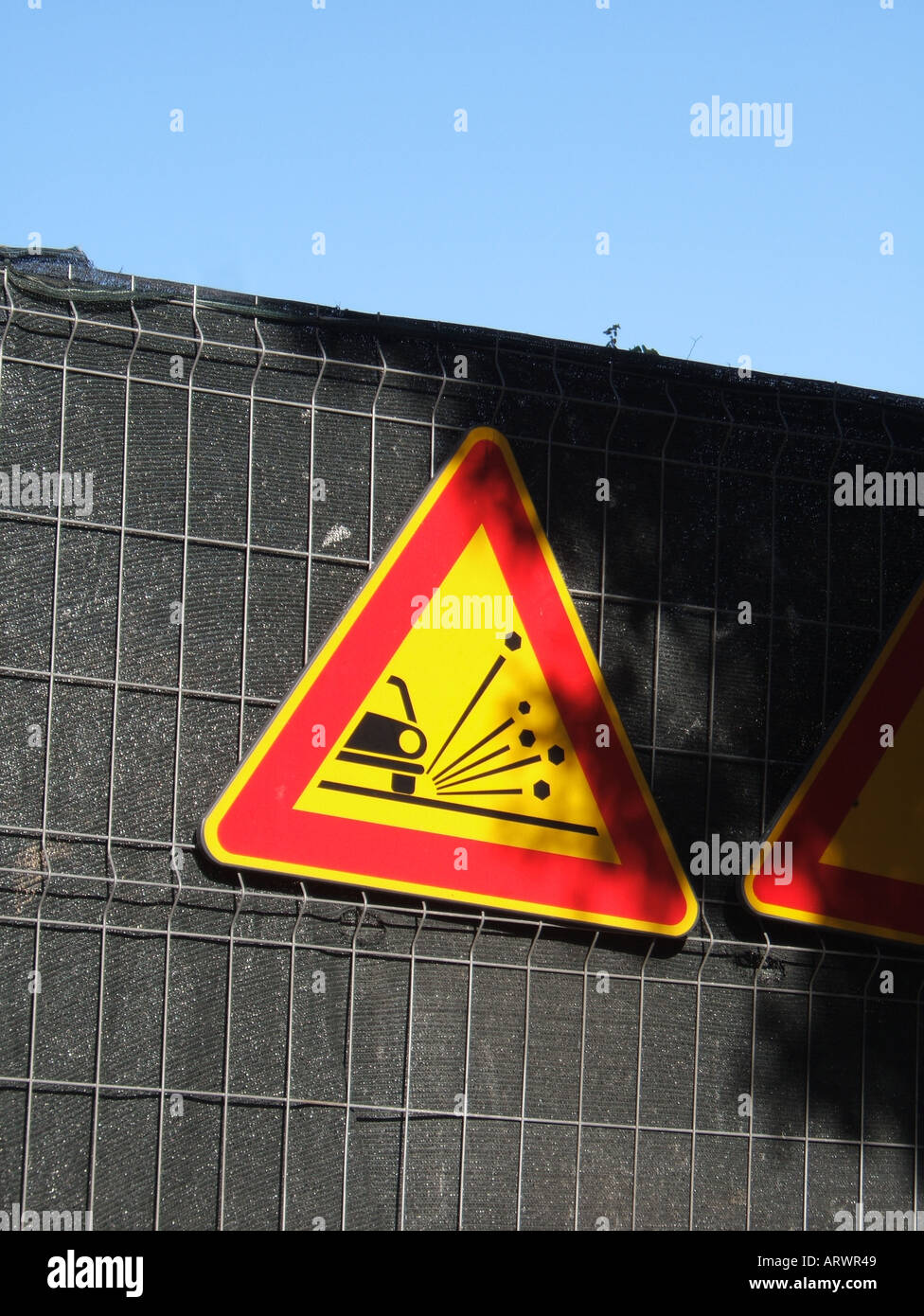 loose chippings warning sign Stock Photo - Alamy