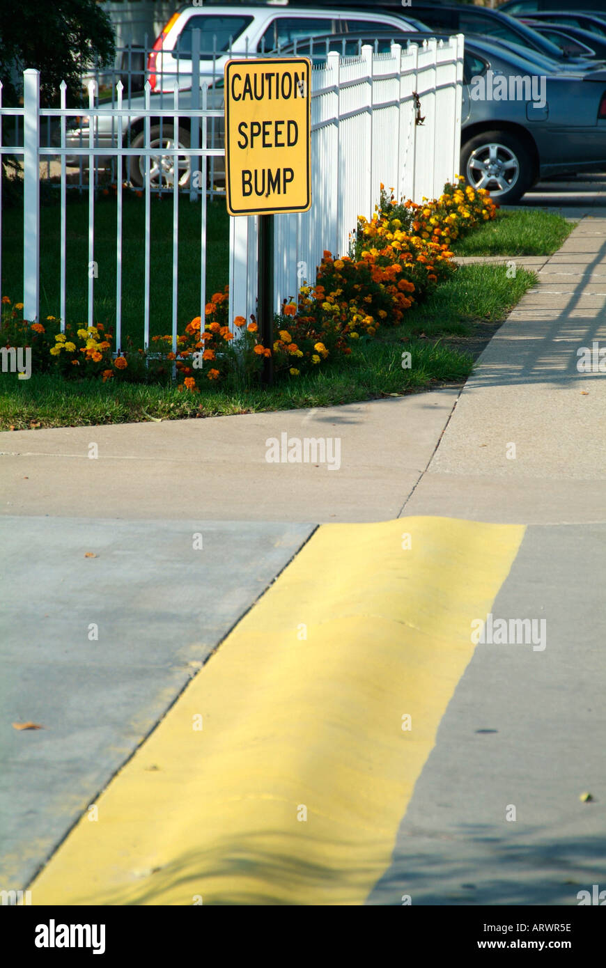 Speed bump on a road to force traffic to drive slowly traffic sign ...