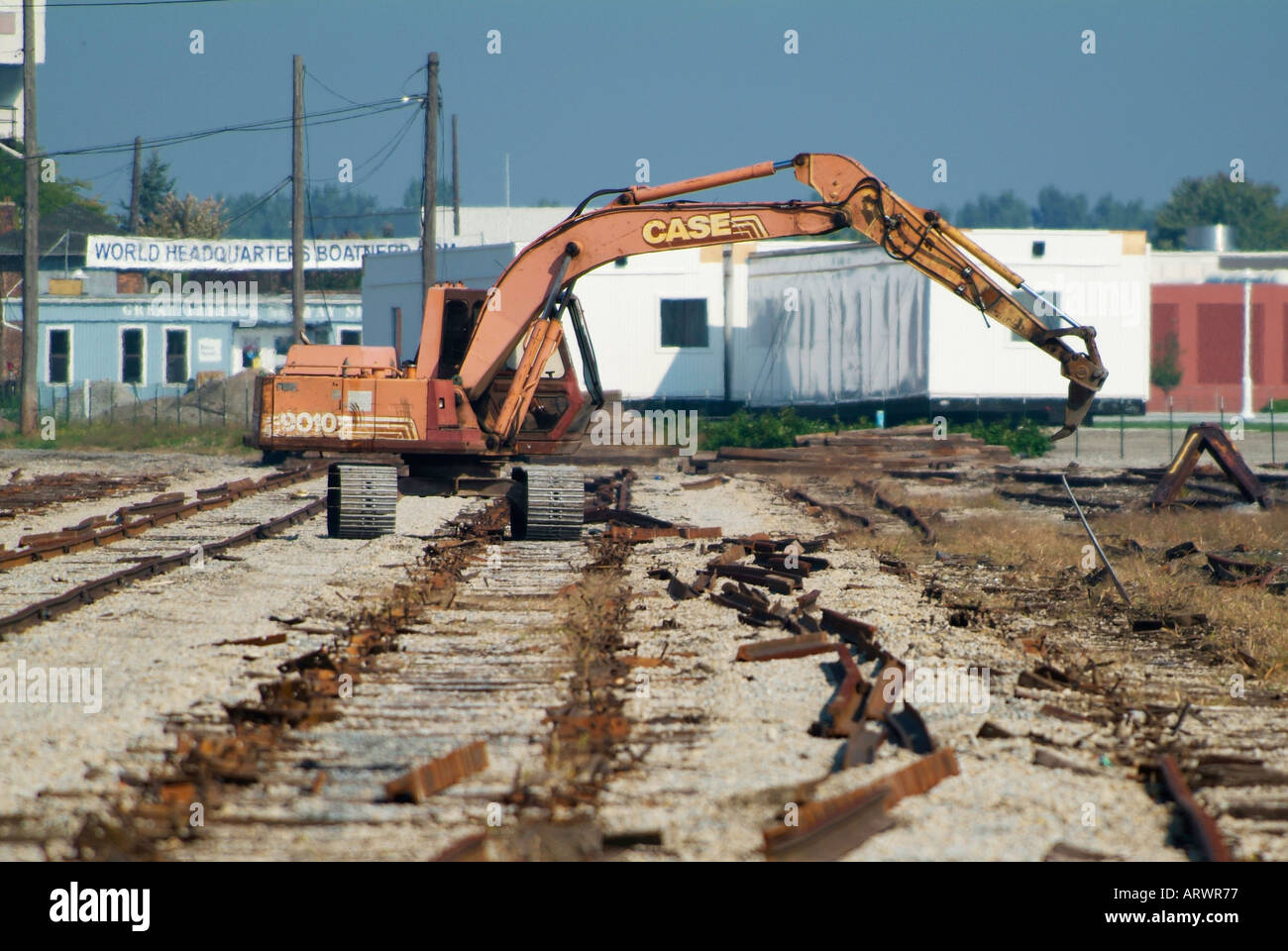 Industrial crane rips out railroad train tracks where new building ...