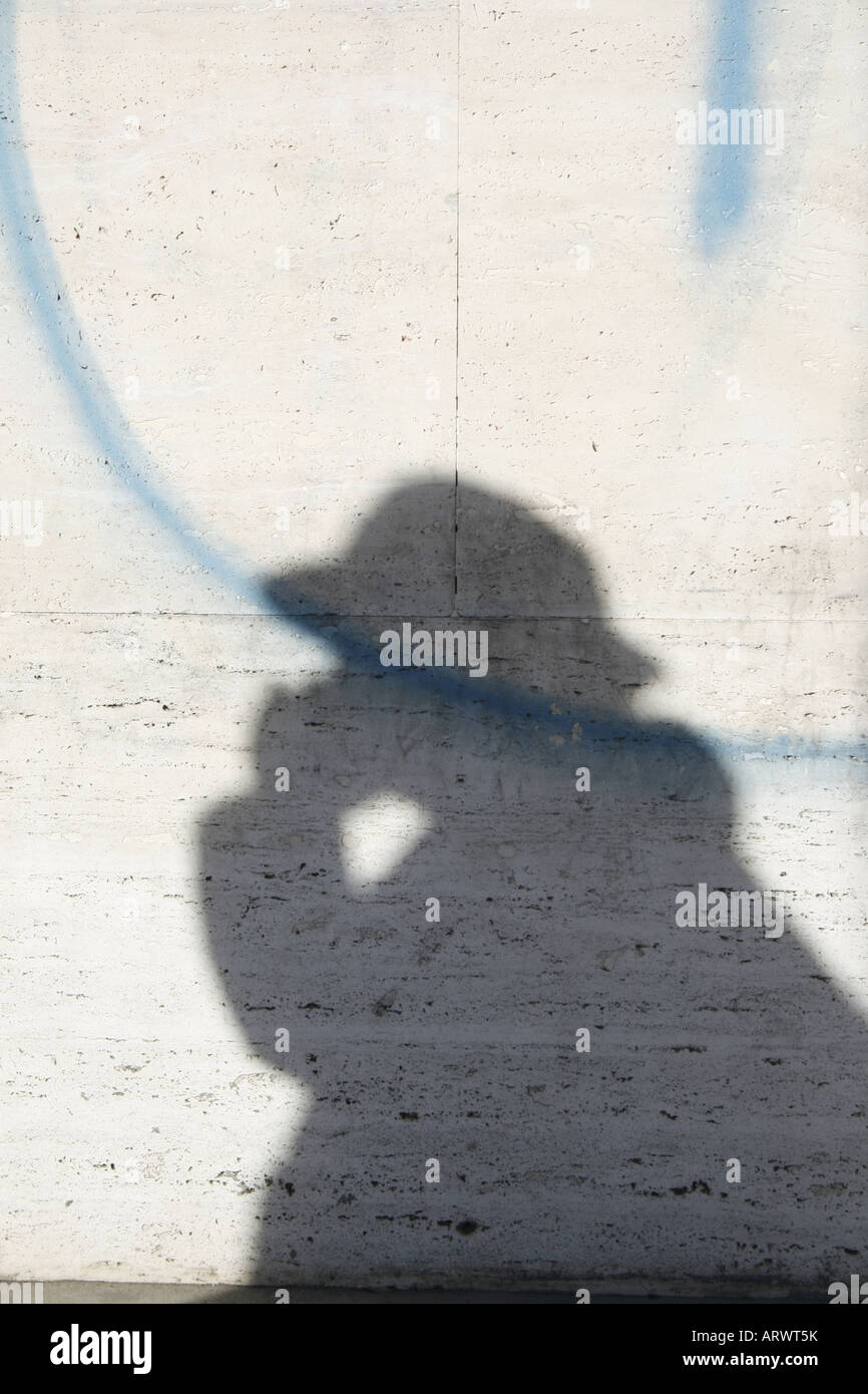 shadow of man talking on mobile phone Stock Photo - Alamy