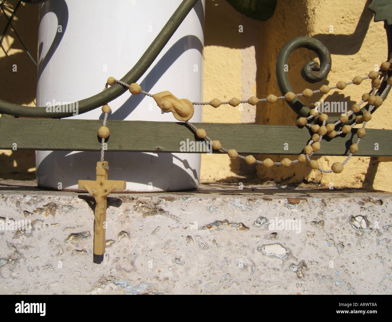 rosary on road side shrine in rome Stock Photo - Alamy