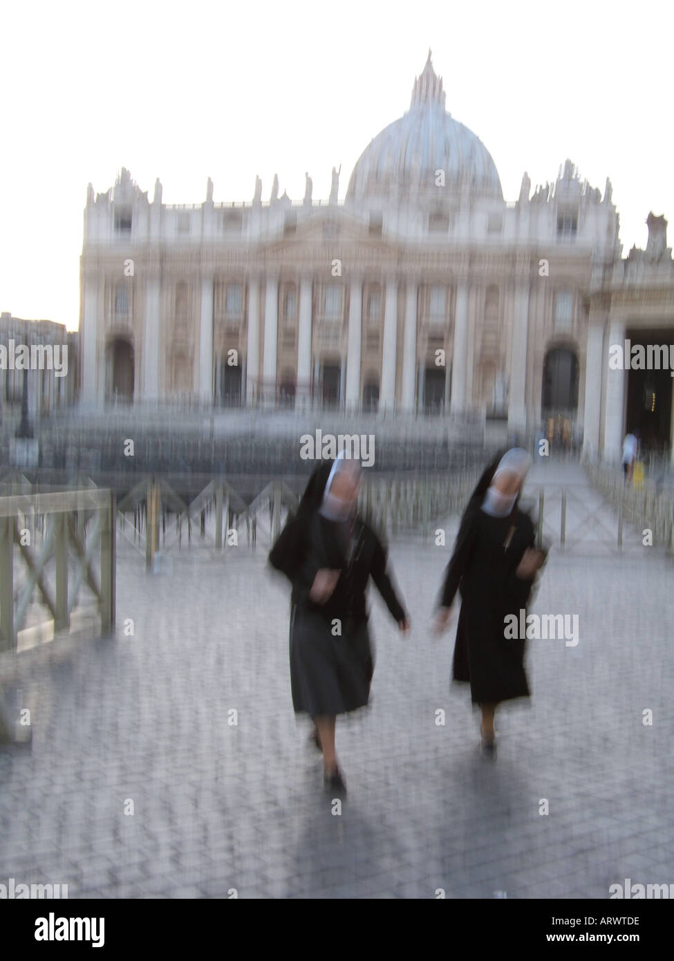 two nuns walking in st peters square, rome Stock Photo - Alamy
