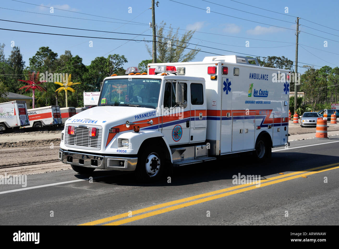 Emergency medical workers at scene of accident Stock Photo - Alamy