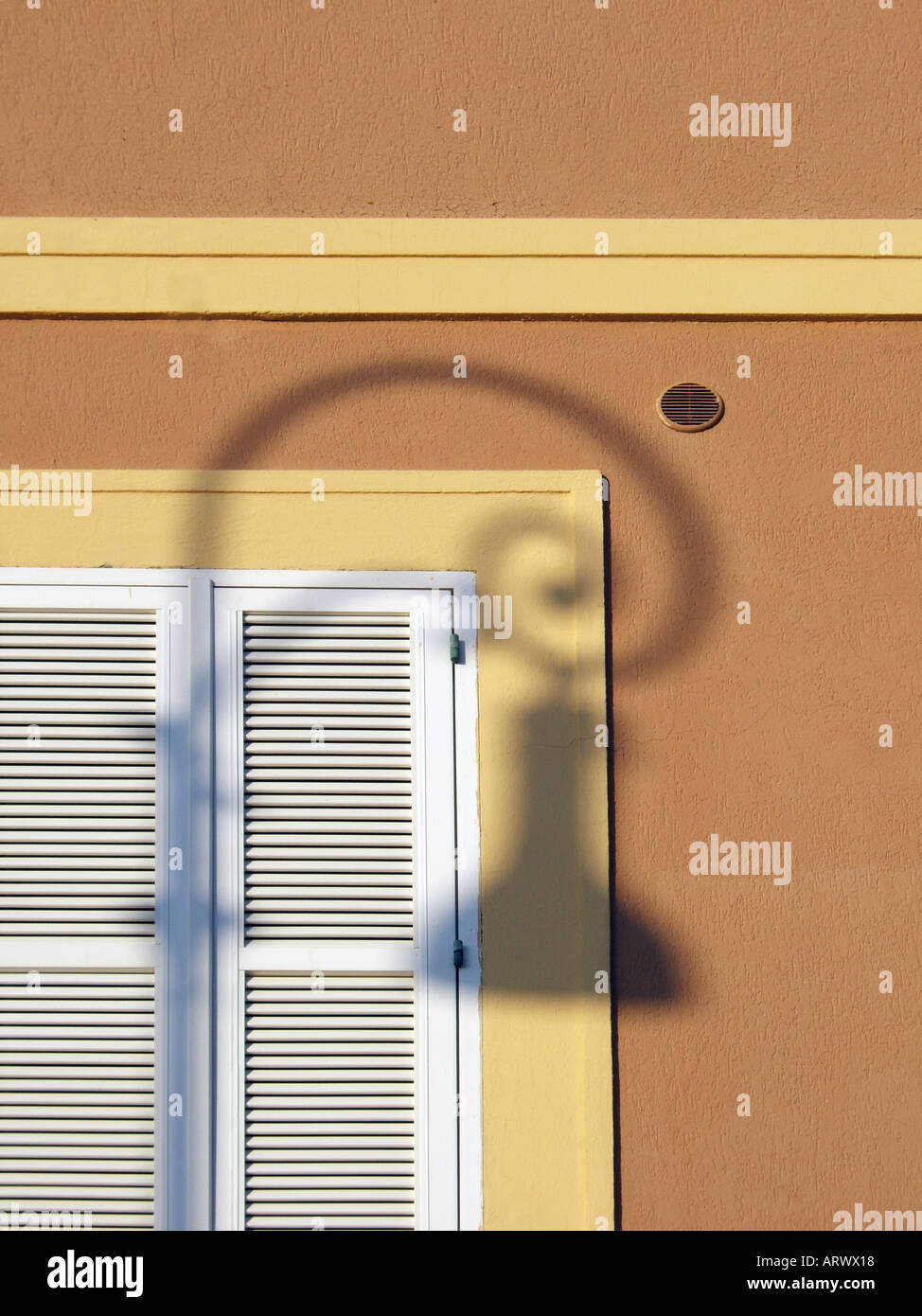 lamp post shadow on house in ostia, italy Stock Photo - Alamy