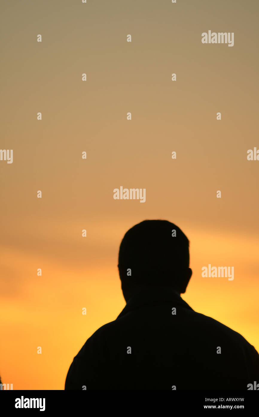 man at sunset Stock Photo - Alamy