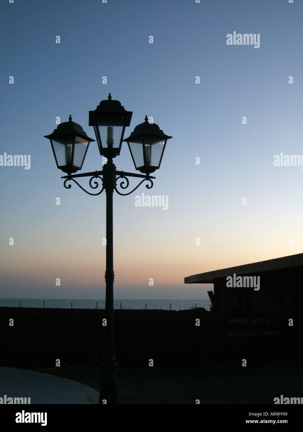 beach resort roof and lamp post at night Stock Photo - Alamy