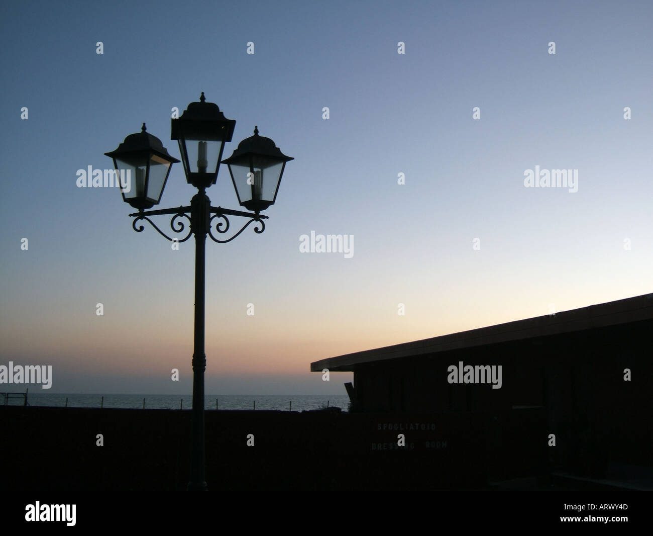 beach resort roof and lamp post at night Stock Photo - Alamy