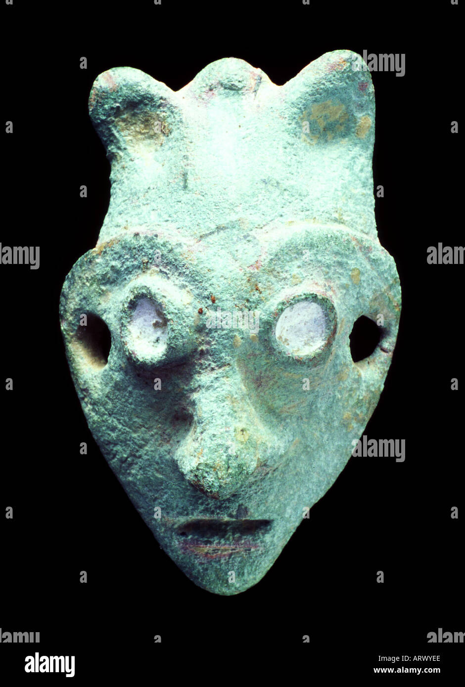 Small ancient bronze face Stock Photo - Alamy