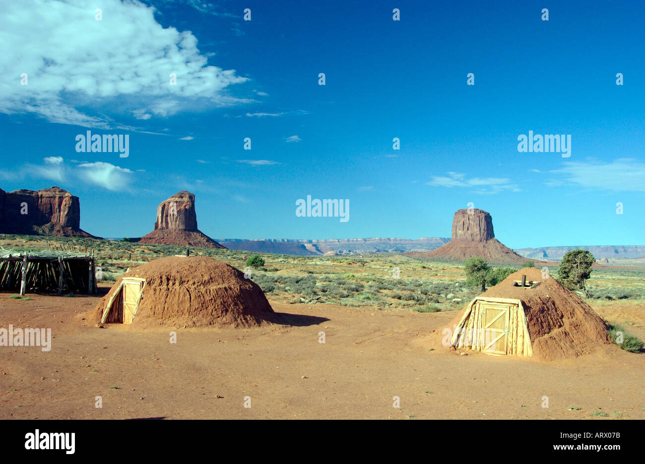 Navajo indian hogans and mitten buttes in Monument Valley Utah USA ...