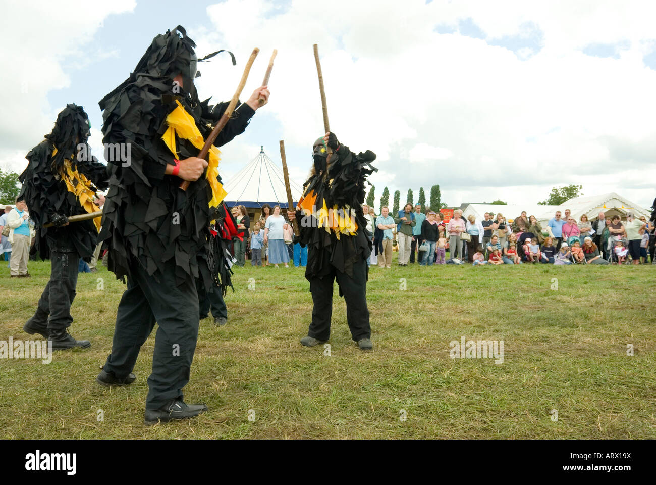 Bedlam Morris Dancers in Black Rag Robes Dance Fight with Sticks in ...