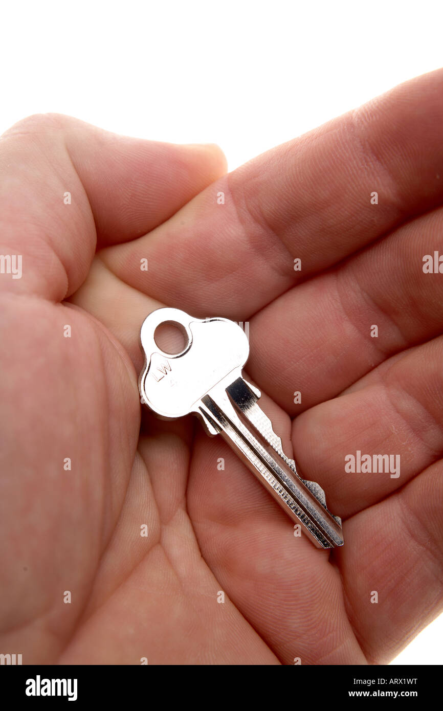 Key in hand Stock Photo - Alamy