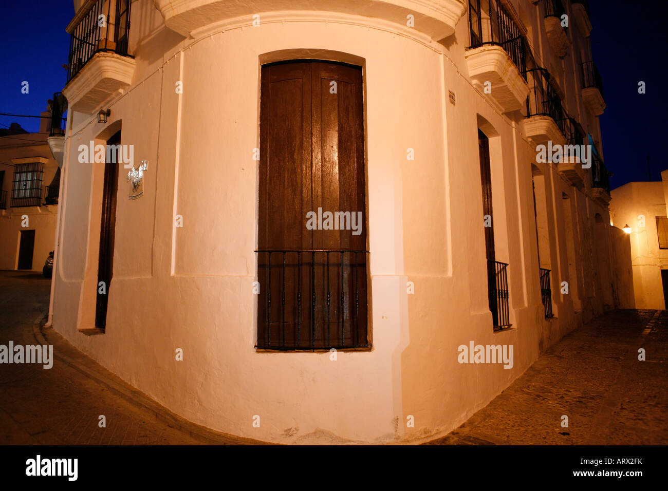 Street, House illuminated at night, Vejer de la Frontera, Andalusia ...