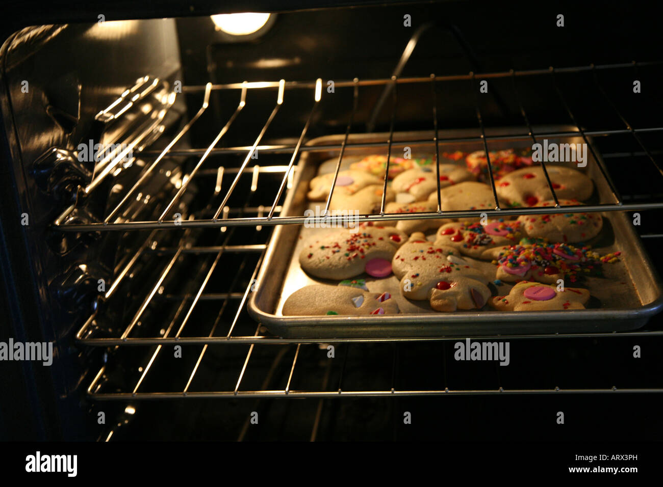 Cookies baking in the oven Stock Photo - Alamy