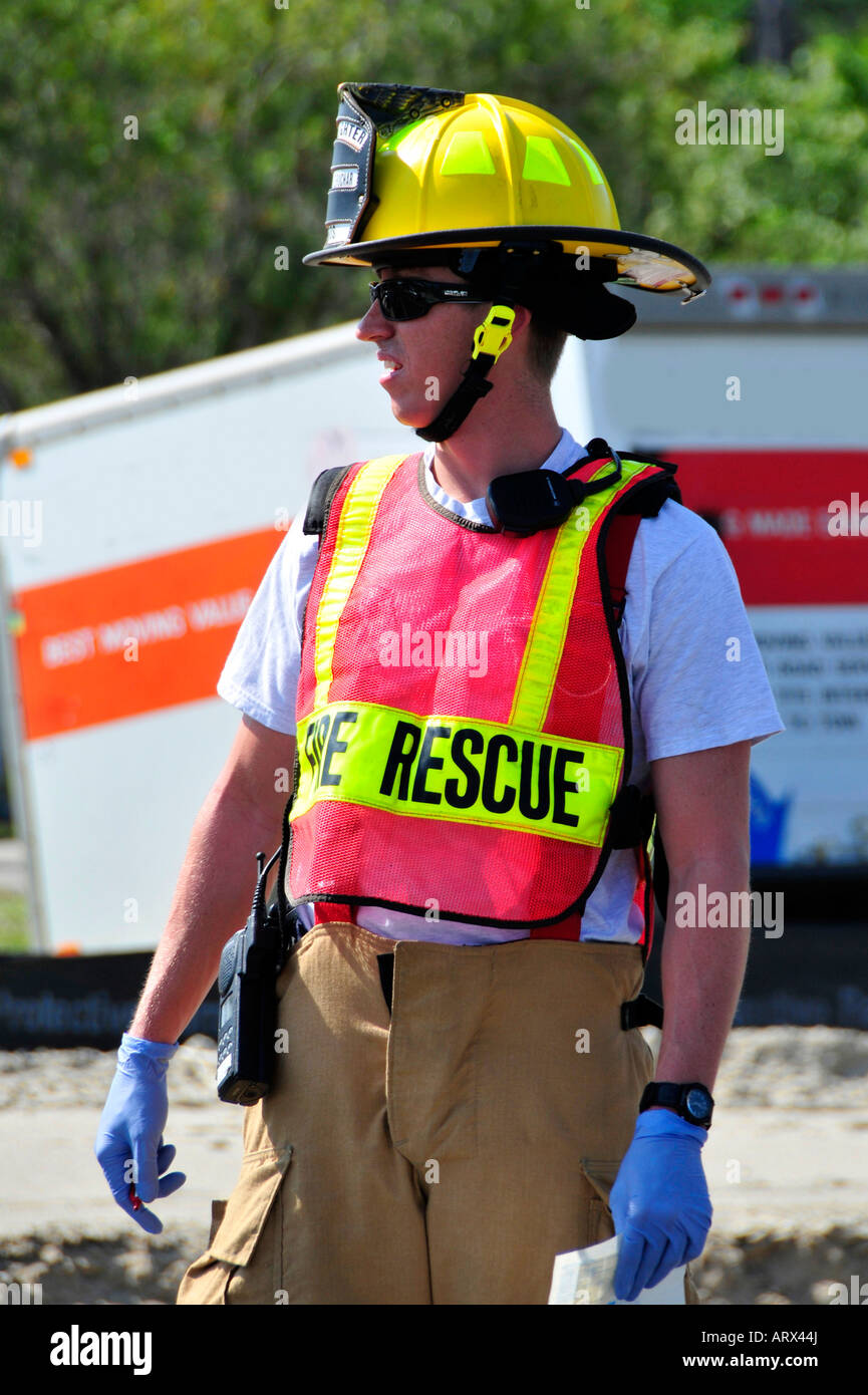 Fireman on the scene of an accident Stock Photo - Alamy