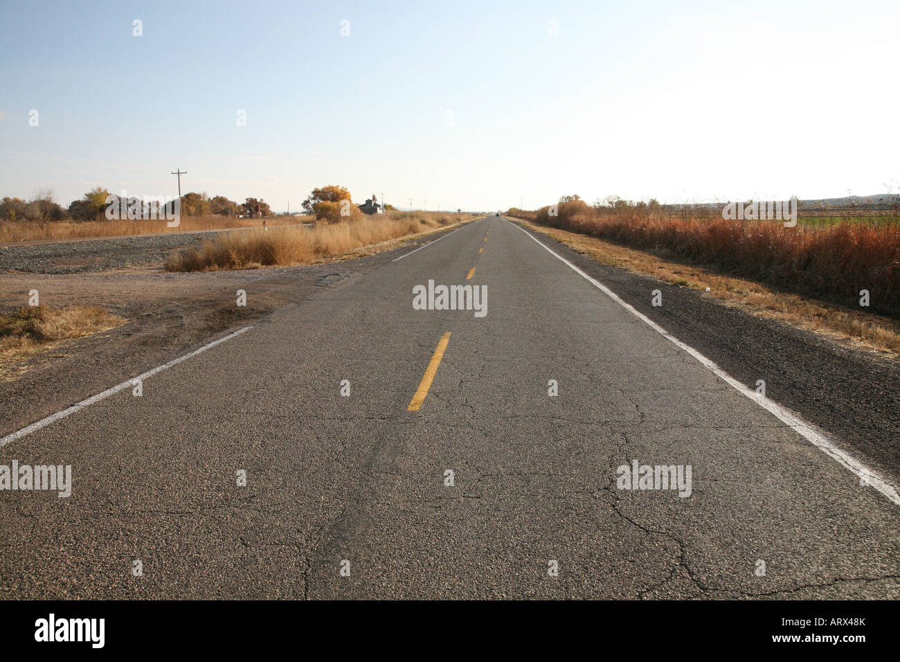 Desolate highway in southwestern, New Mexico. Open road Stock Photo - Alamy