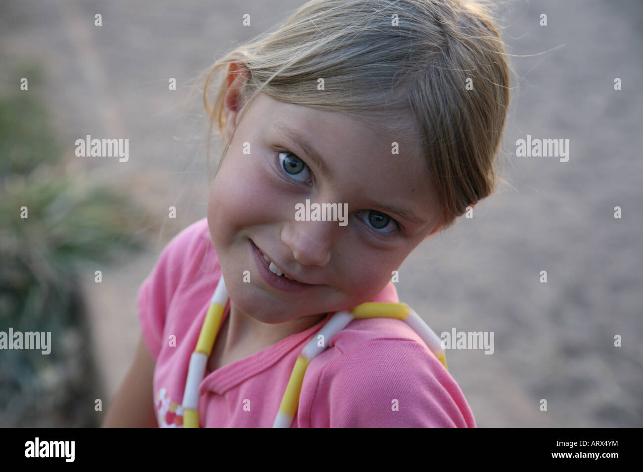 Seven year old girl, smiling shyly, closeup Stock Photo - Alamy