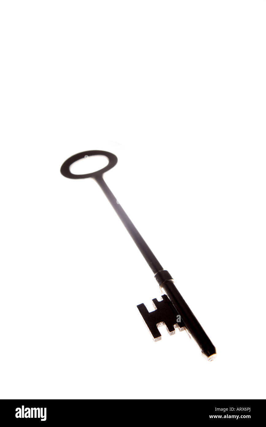 Skeleton key isolated over white Stock Photo - Alamy