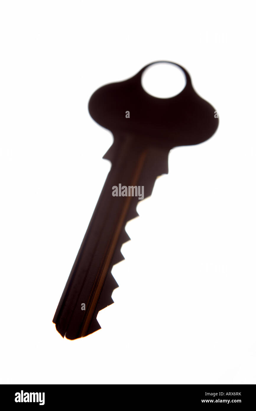 Single house key on white Stock Photo - Alamy